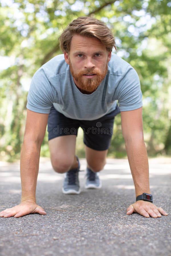 Strong Man Doing Sport Push-up in Park Looking at Camera Stock Image ...