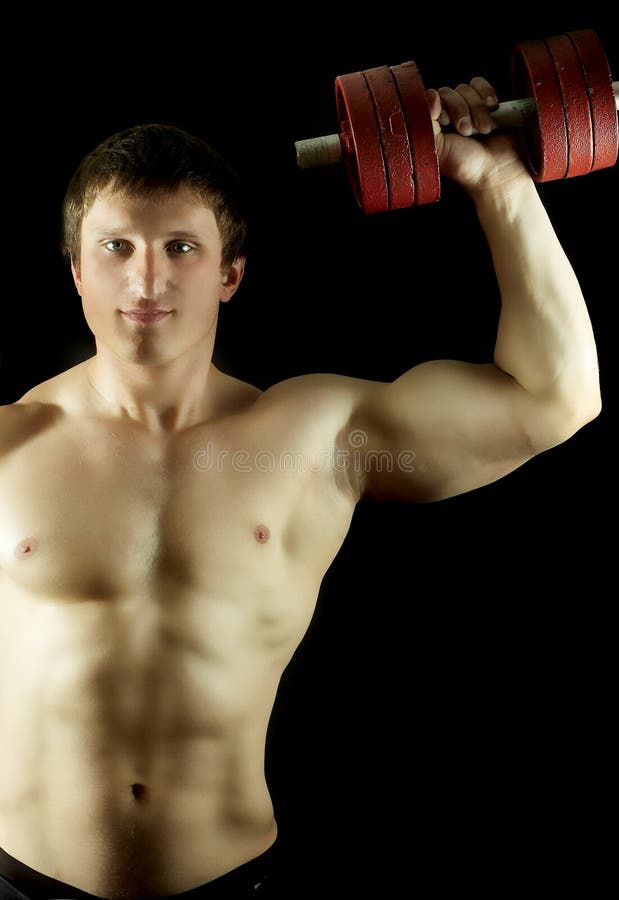 Strong Man Keeps Dumbbell Picture. Image: 7702800
