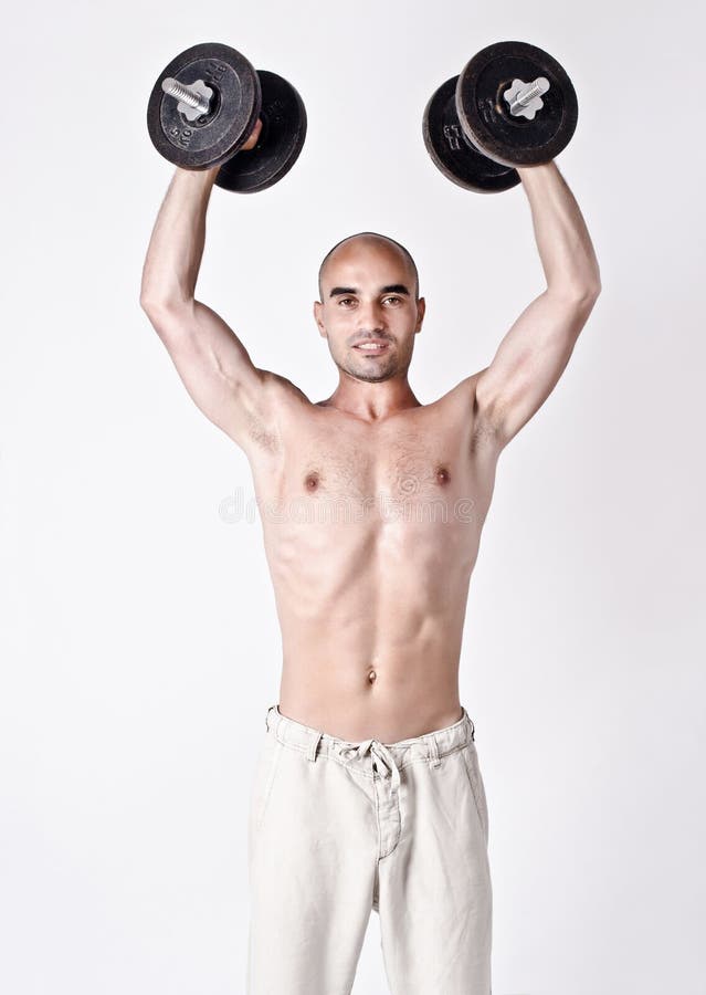 Strong Man Lifting Weights for the Biceps. Stock Photo - Image of ...