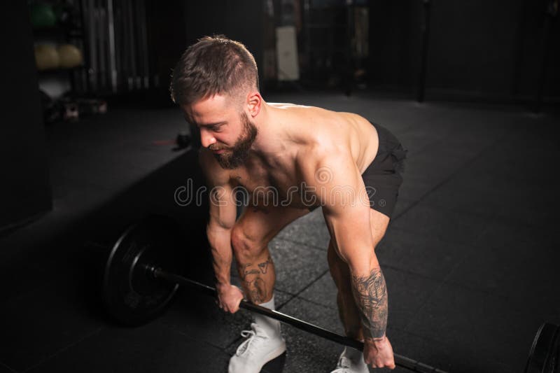 Strong Man Performing Deadlift with Barbell. Routine Workout for ...