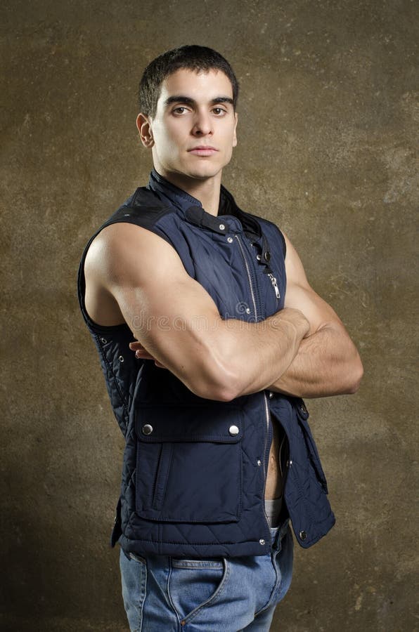 Strong man posing stock image. Image of masculine, open - 49969703