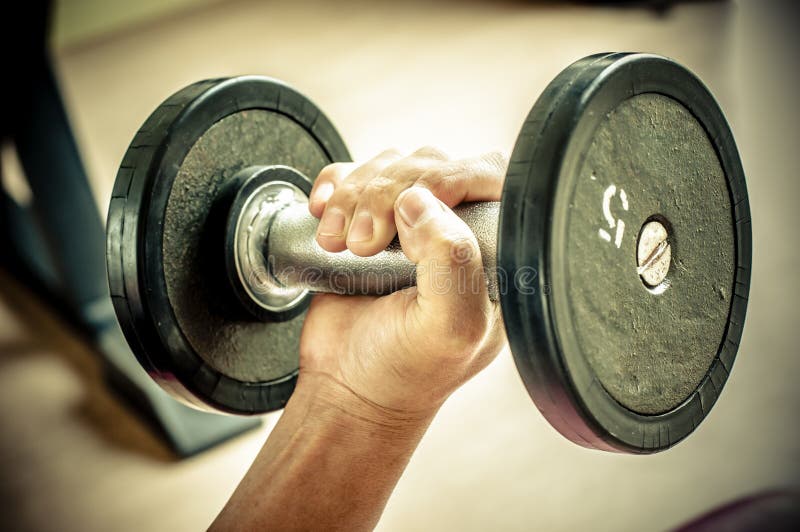 Strong Man S Hand Takes a Heavy Dumbbell Stock Photo - Image of ...