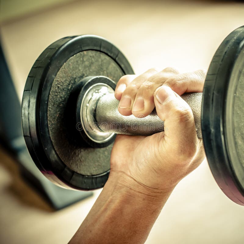 Strong Man S Hand Takes a Heavy Dumbbell Stock Photo - Image of indoors ...