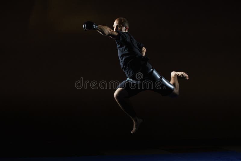 Strong Man Strikes with a Hand in a Jump Stock Image - Image of health ...