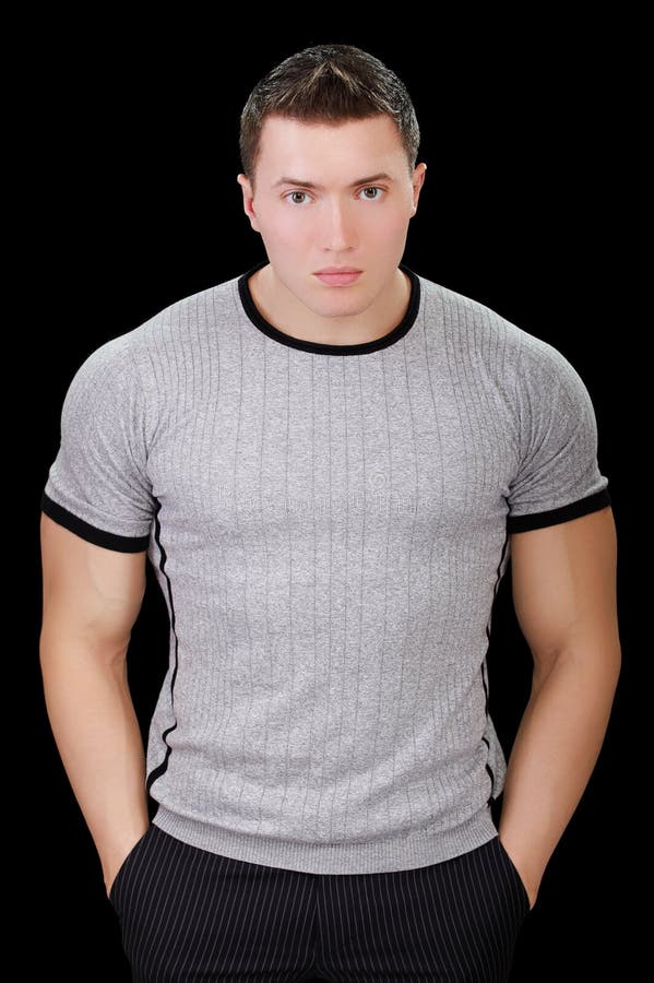 Strong man in t-shirt stock image. Image of portrait - 16458313
