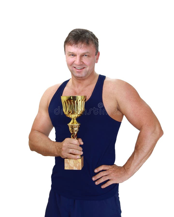 Strong man with winner cup stock image. Image of bodybuilder - 43933543