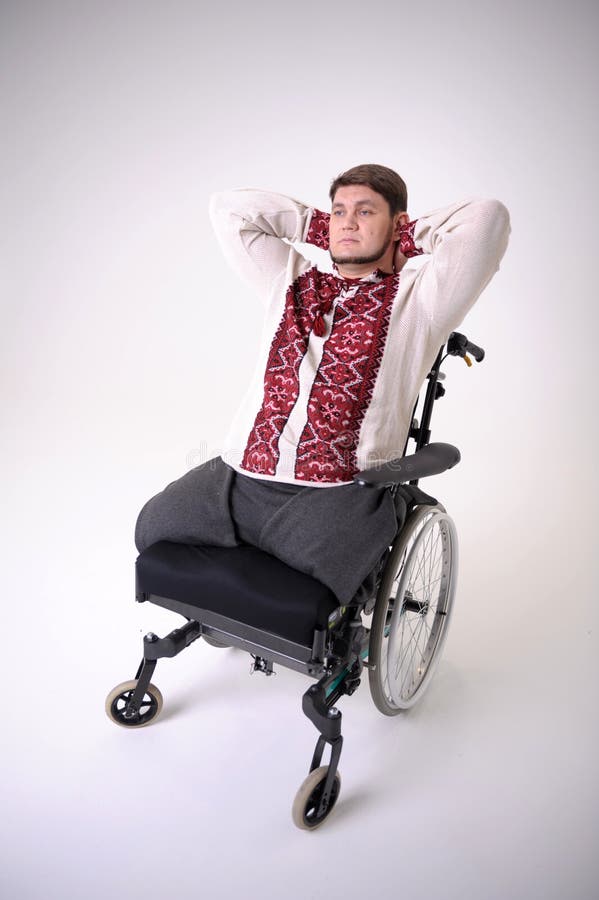 Strong Military Man in a Chair without Limbs Prosthetics Stock Image ...
