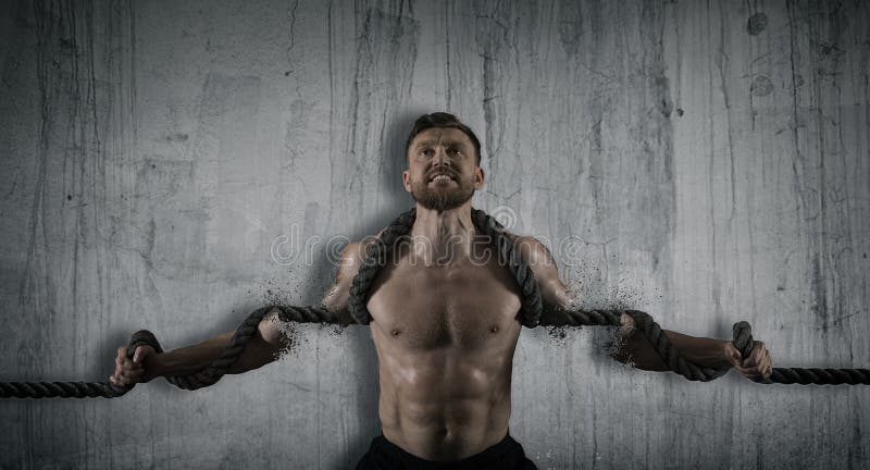 Strong Muscular Man with a Rope Stock Photo - Image of athlete, healthy ...