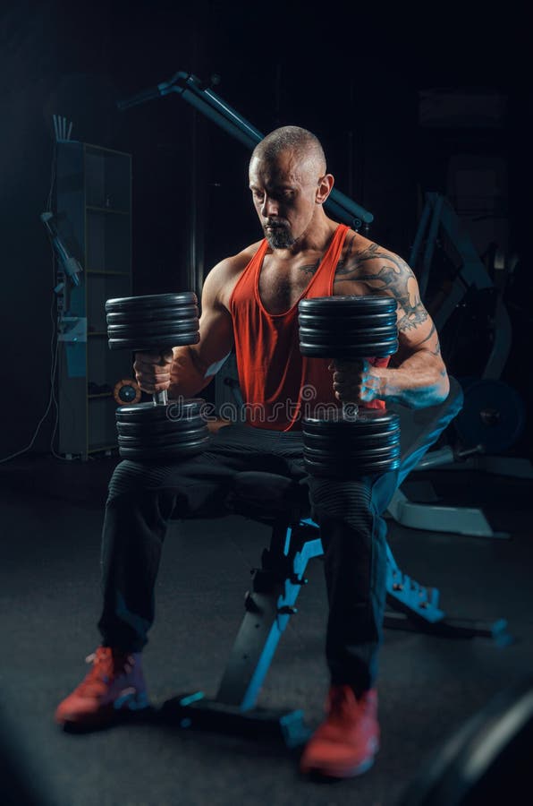 Strong Muscular Man Trains in the Gym Stock Image - Image of healthy ...