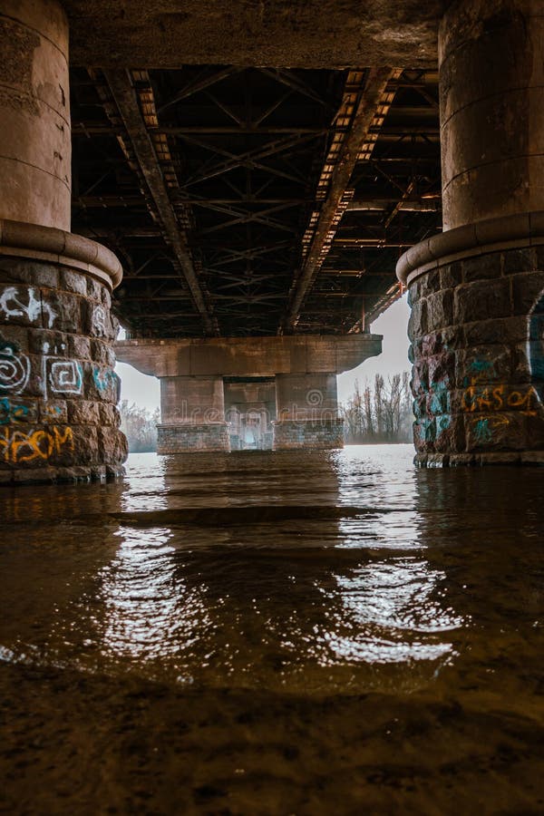 Strong Pillars of the Bridge Over the River Stock Image - Image of beam ...