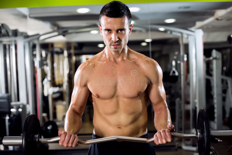 Strong man work out biceps stock image. Image of athlete - 64258705