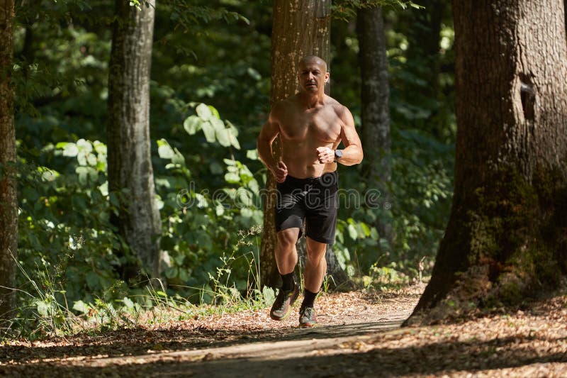 Shirtless Trail Runner in the Forest Stock Photo - Image of health ...
