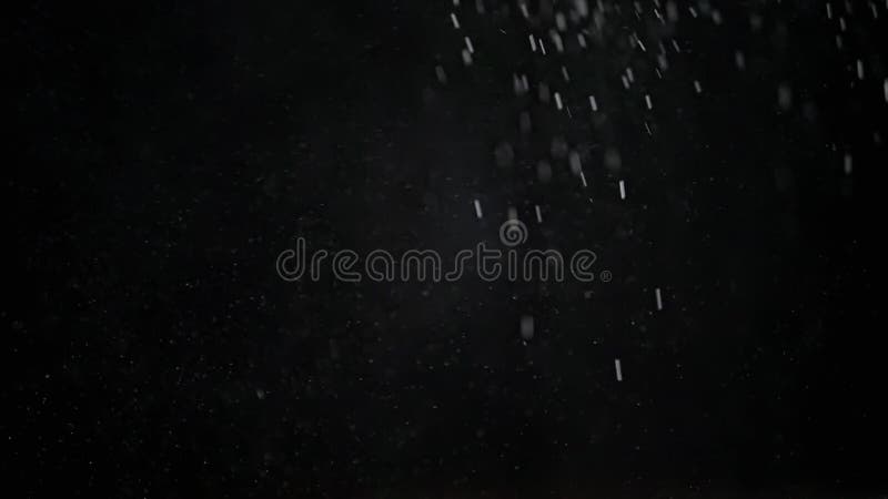 Strong Snowstorm with Wind and Falling Snow Particles on a Black ...