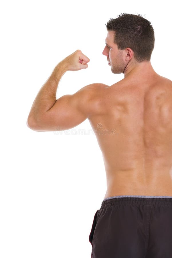 Strong Sports Man Showing Biceps. Rear View Stock Photo - Image of ...