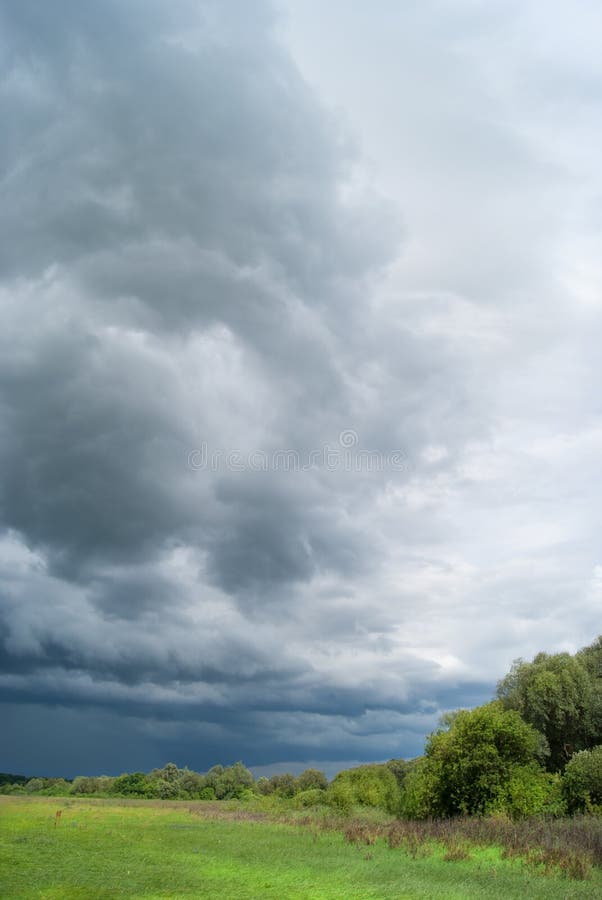 Strong Storm Clouds Over the Valley Stock Photo - Image of green ...