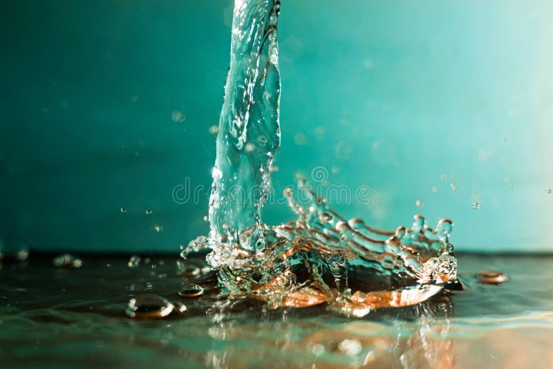A Strong Stream of Water Making a Splash Macro Stock Photo - Image of ...