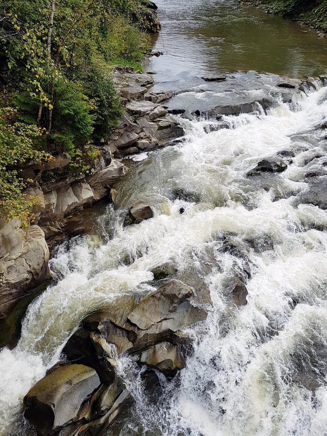 Strong Streams of Water in the River in the Fall. Stock Image - Image ...
