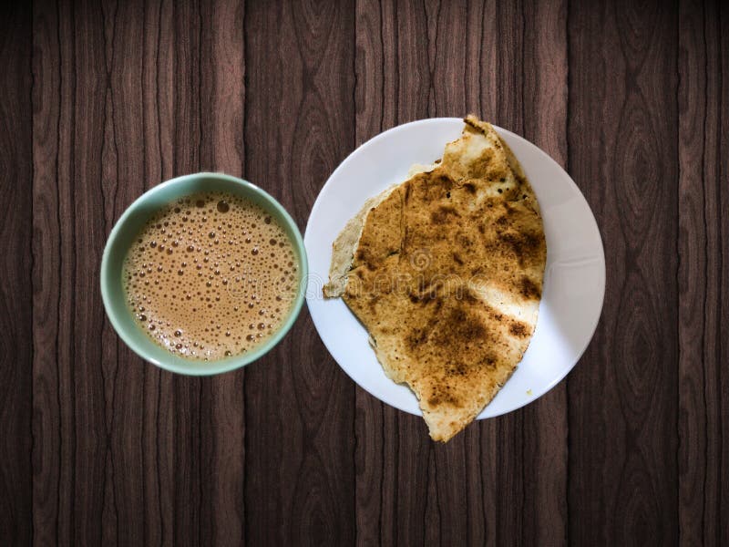 Kuboos Or Khubz - Arabic Bread On A Brown Table In The Kitchen Stock ...