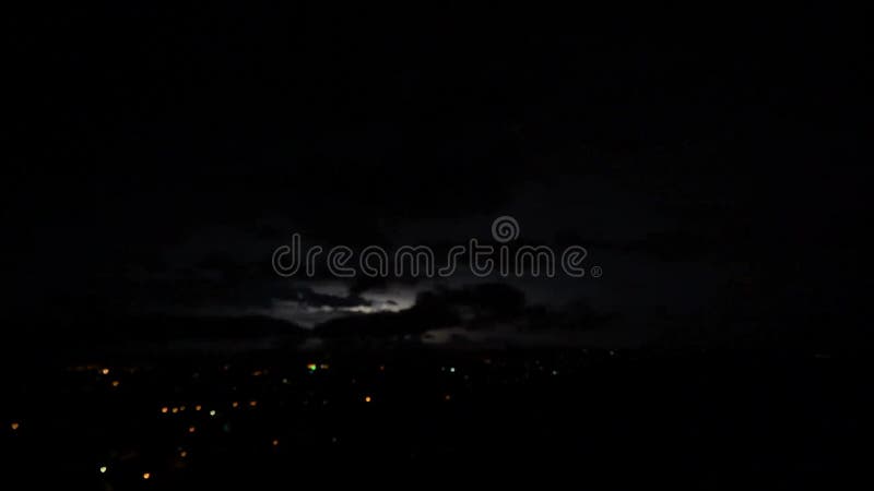 A Strong Thunderstorm with Lightning in the Clouds. Night Sky during a ...