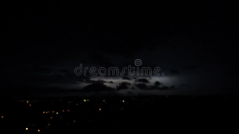 A Strong Thunderstorm with Lightning in the Clouds. Night Sky during a ...