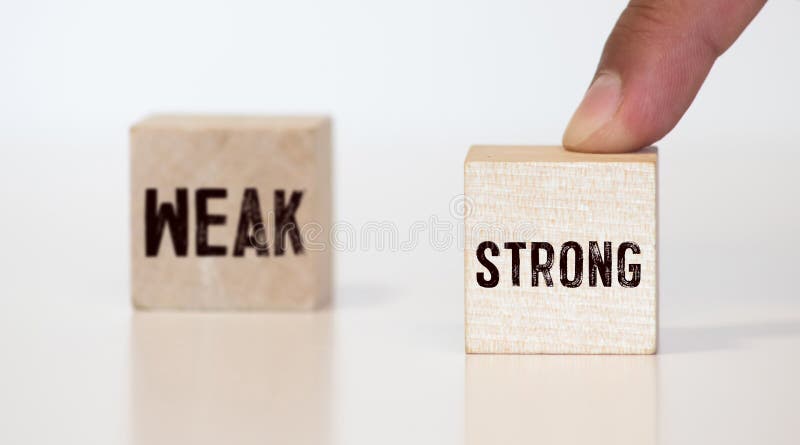 Strong Versus Weak Text on Wooden Block Stock Photo - Image of notepad ...