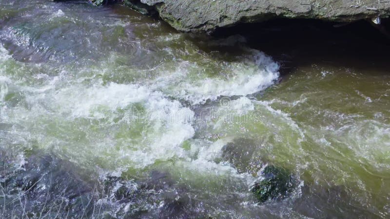 A Strong Water Current with Bubbling Waves and Rocks at the Riverbed Stock Footage - Video of ...