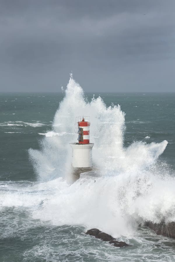 Strong Waves Crash Against the Lighthouse Stock Image - Image of ...