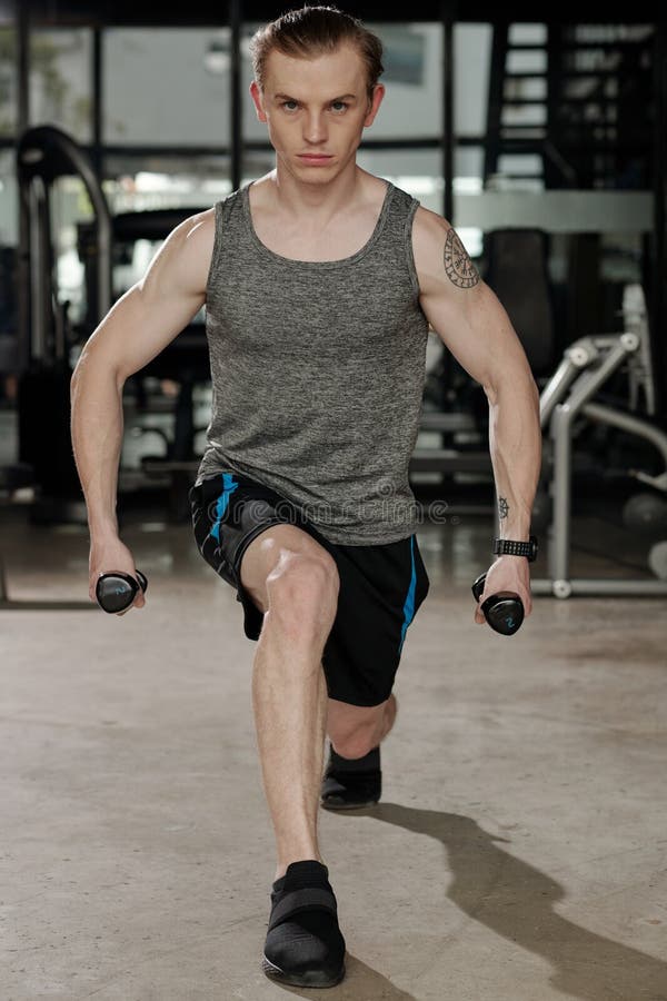 Man Doing Forward Lunges stock photo. Image of endurance - 244702968