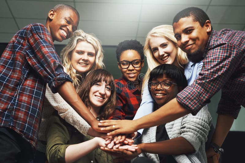 We are Stronger As a Team. a Group of Cheerful Work Colleagues Forming ...