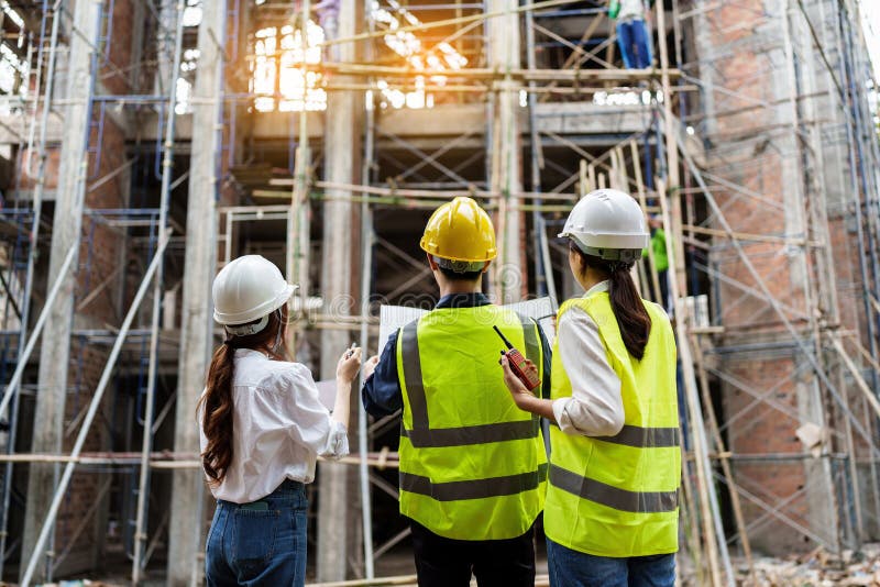 Structural Engineer and Architect Discussing and Working with ...