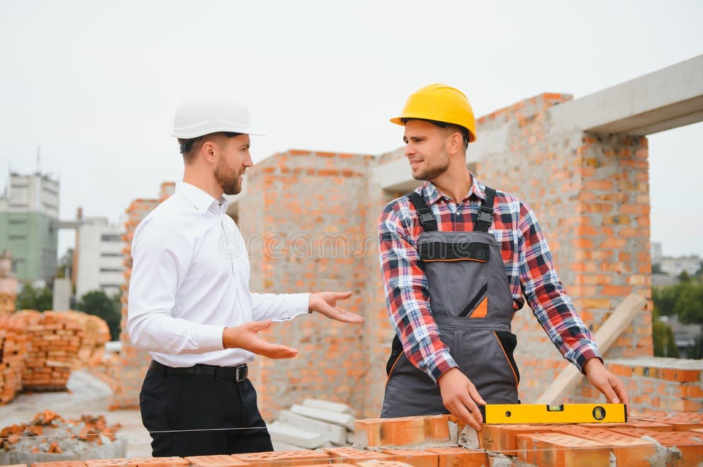 Structural Engineer and Foreman Worker Discuss, Plan Working for the ...