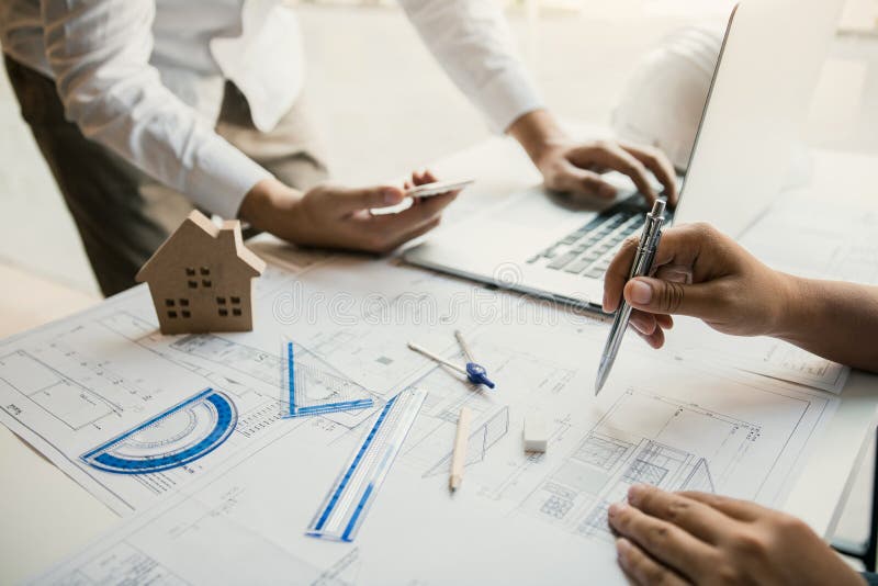 Structural Engineering Designers are Working on the Blueprints and ...