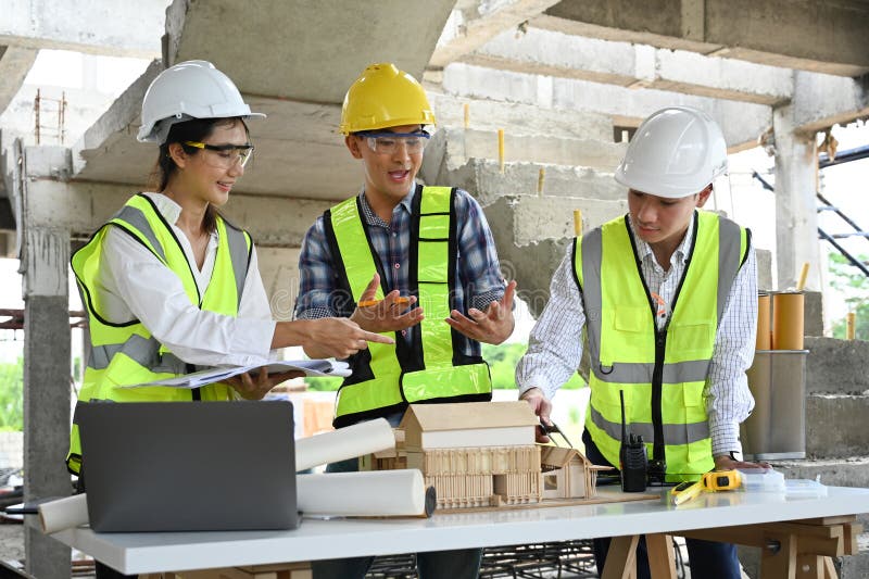 Structural Engineers Team and Businessman Planning Development Details ...