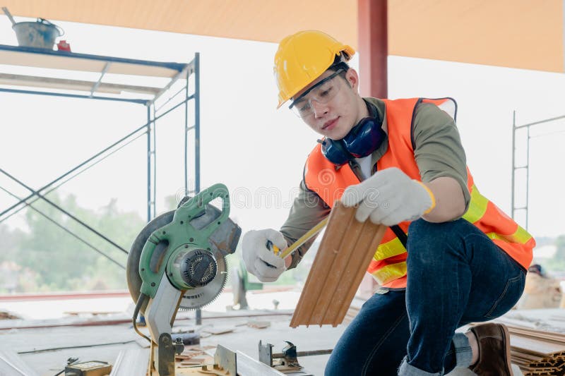 Structural Worker Dressed in Safety Gear and Hard Hat Doing ...