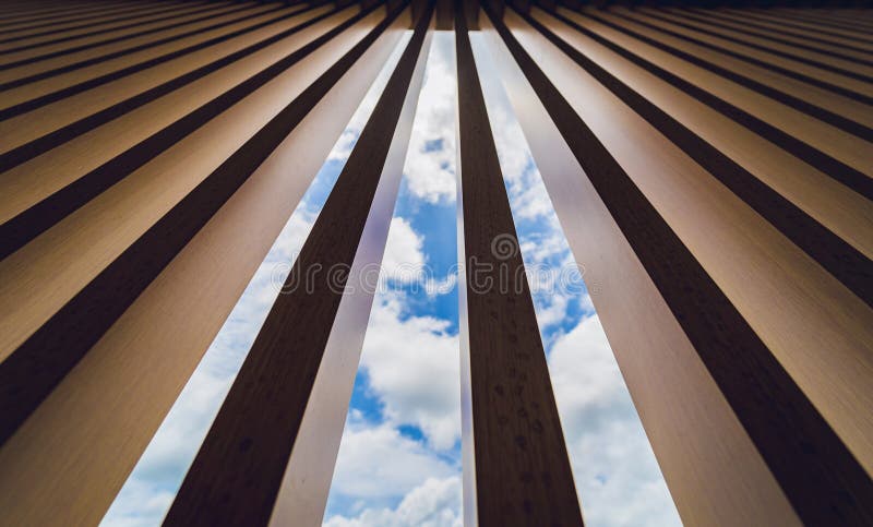 A Structure Featuring Wooden Slats on Construction Site Contributing To ...