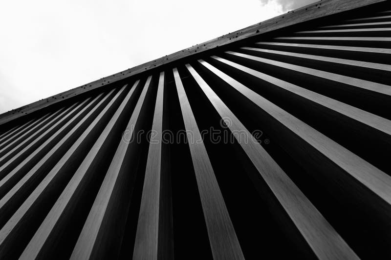 A Structure Featuring Wooden Slats on Construction Site Contributing To ...