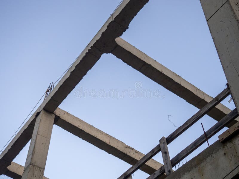 Structure Made of Concrete Piles. Frame of a House Under Construction ...