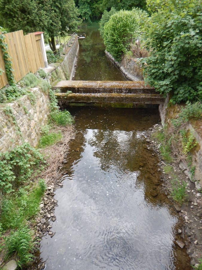 Structure Over a Small Cultivated Stream Stock Photo - Image of ...