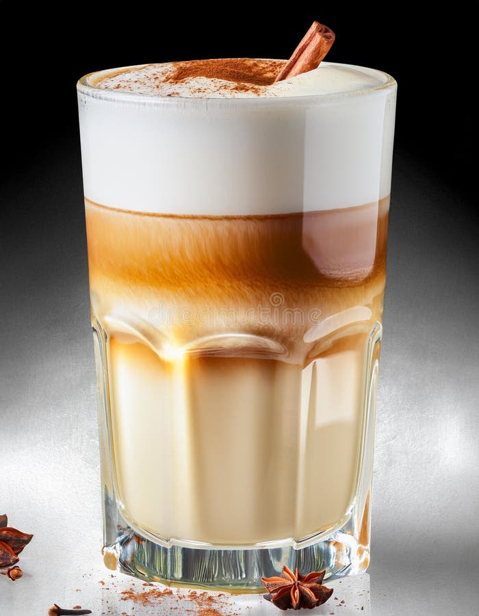 Layered Latte Macchiato with Whipped Cream and Cinnamon in Glass ...