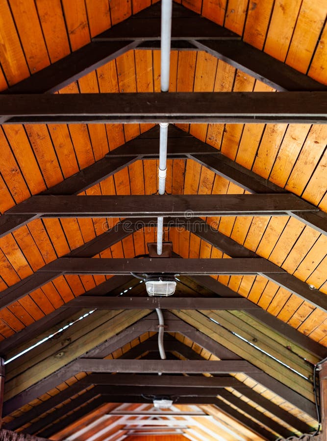 Structure of a Triangular Roof Extending into the Distance Stock Photo ...