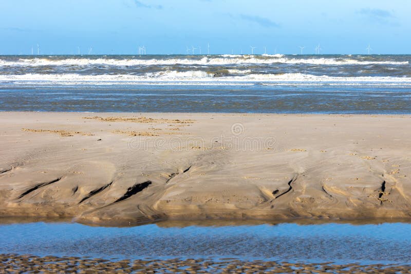 Structures in the Sand on a Beach of the North Sea, with a Rough Sea ...