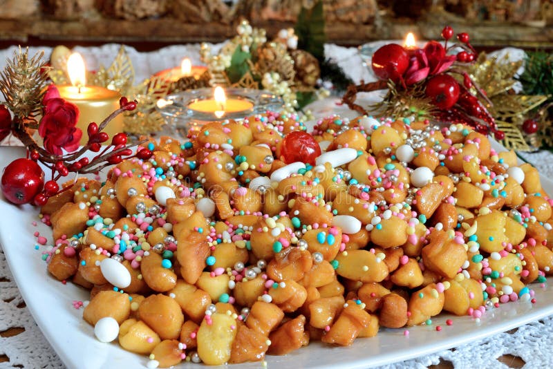 Struffoli stock photo. Image of candle, balls, neapolitan - 36257814