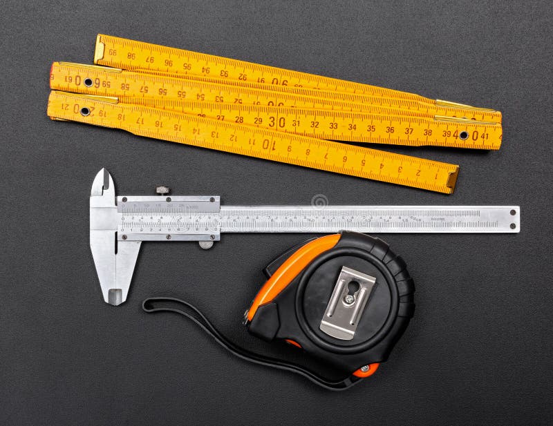Strumenti Di Misurazione Su Nero: Righello, Calibro E Metro a Nastro ...