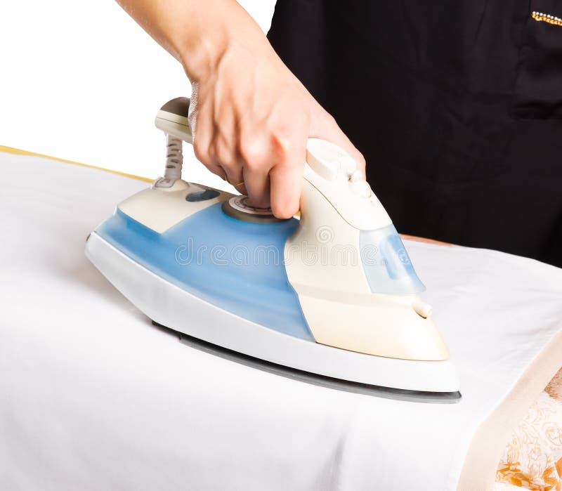 Stryka kläder fotografering för bildbyråer. Bild av upphettad - 33922535