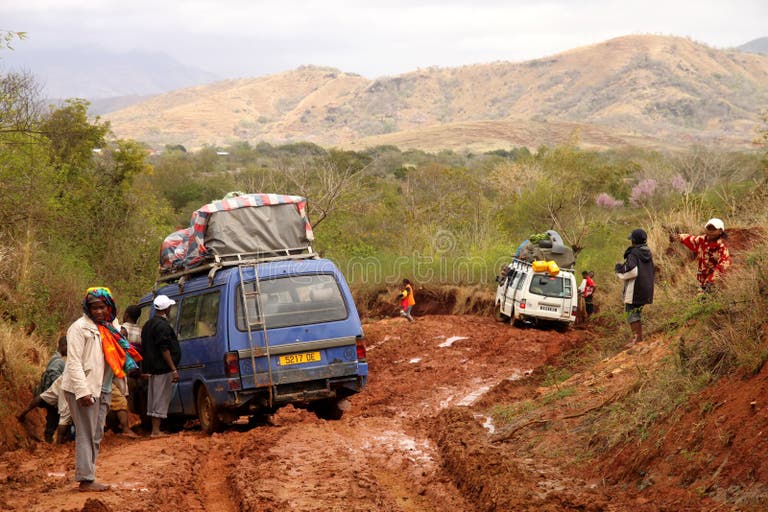 Car Stuck Mud Push Stock Photos - Free & Royalty-Free Stock Photos from ...