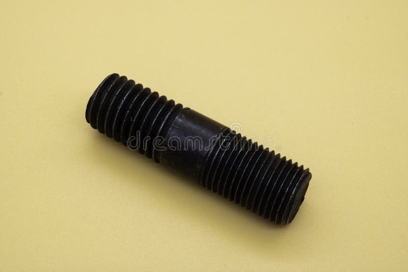 Cones and Studs or Threaded Bottom of Steel Bars Closeup. Industrial ...