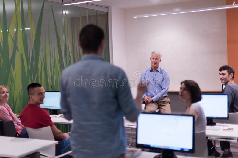 Student Answering a Question in Classroom Stock Photo - Image of ...