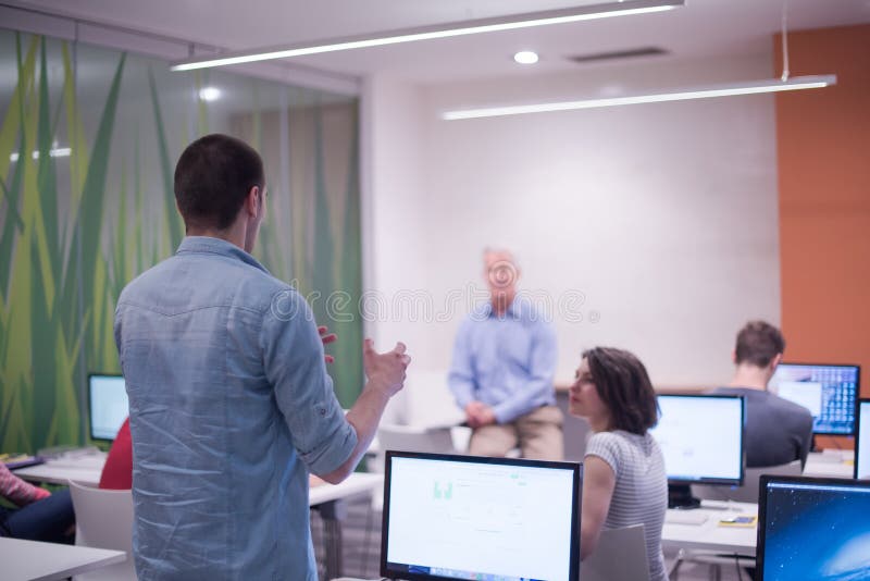 Student Answering a Question in Classroom Stock Photo - Image of desk ...
