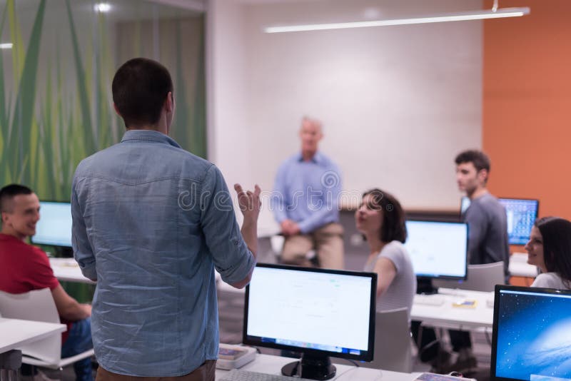 Student Answering a Question in Classroom Stock Image - Image of desk ...