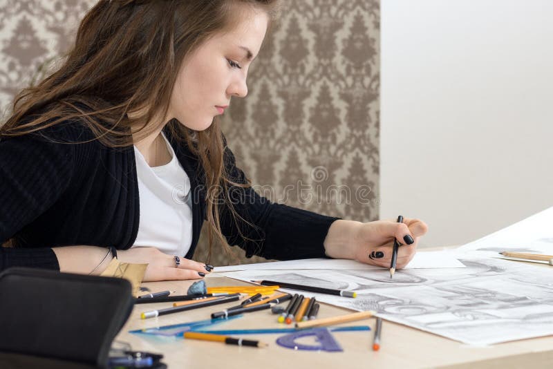 Woman Architect Draws a Plan, Design, Geometric Shapes by Pencil on ...